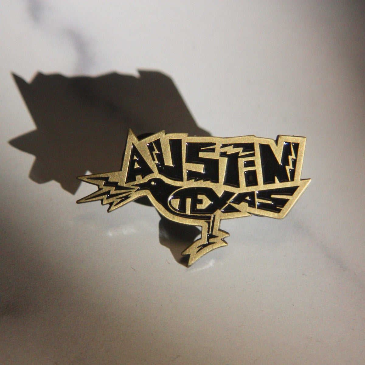 Austin Grackle Pin – Letterpress PLAY